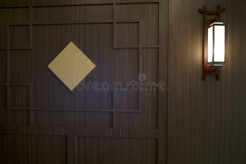 A Soft Light Wall Lamp on Wooden Wall, a Soft Glow in a Dark Room Stock Photo - Image of wood ...
