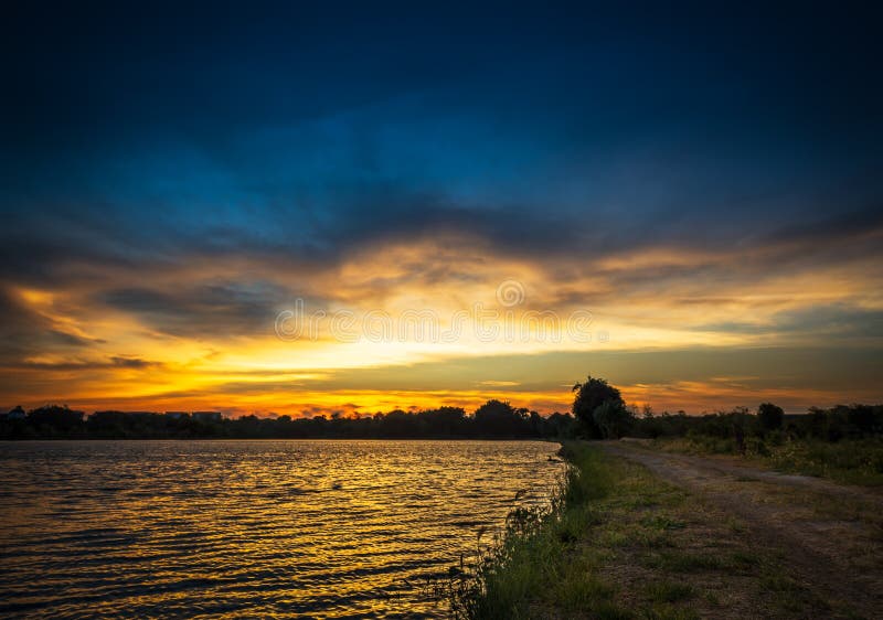 Sunset at riverside stock photo. Image of scenic, sunset - 103019850