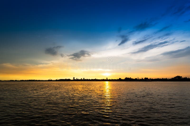 Sunset at riverside stock photo. Image of cloudy, sundown - 110178168