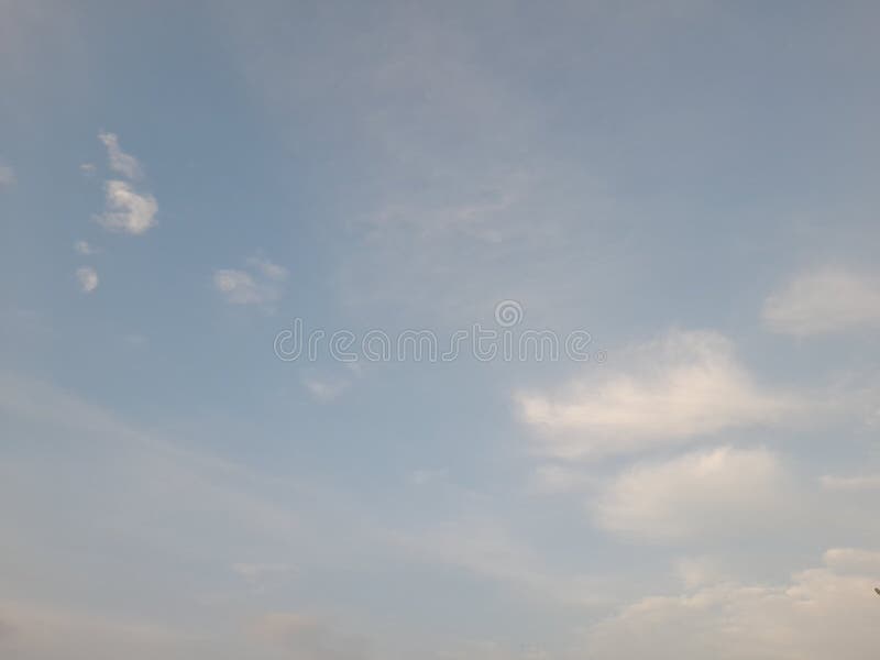 A Soft, Muted Sky with Light Clouds Creating a Peaceful and Serene ...