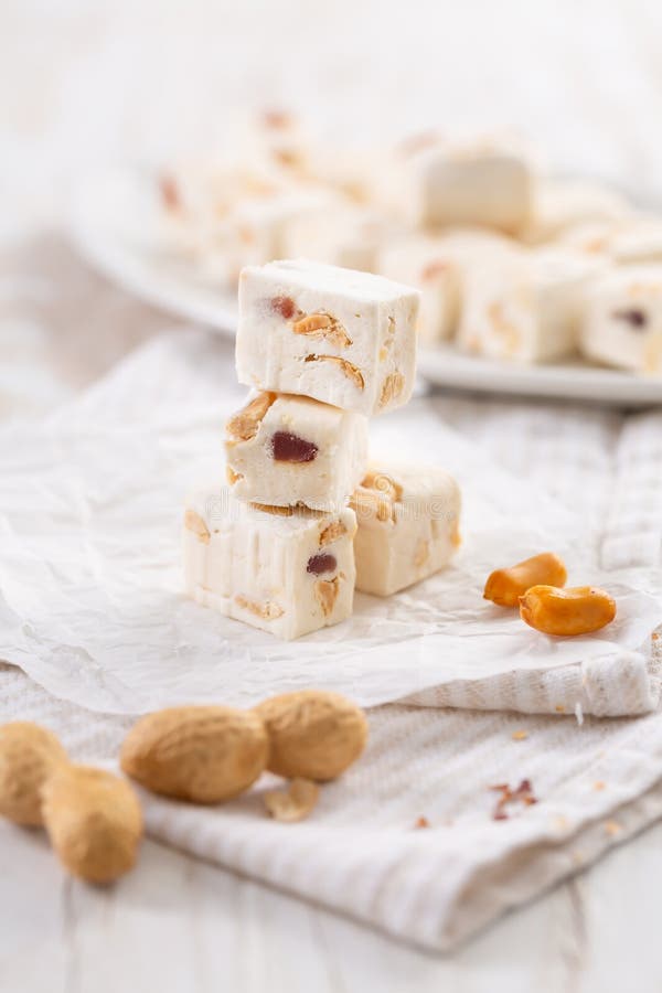 Soft Nougat with Peanuts on a Plate, Chewy Sweets with Nuts Stock Image ...