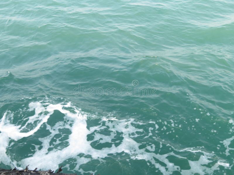 Soft ocean waves with foam stock photo. Image of natural - 254868928