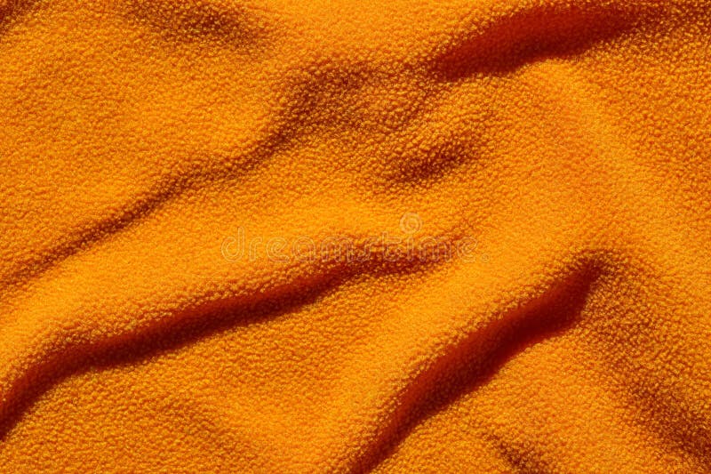 Soft Orange Fabric Texture with Dynamic Folds and Shadow Play Creating ...