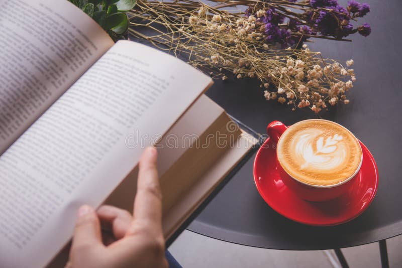 Soft Photo Reading a Book and Drinking Coffee. Stock Image - Image of ...