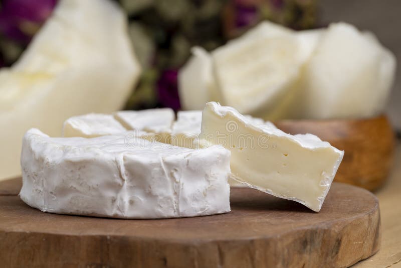 Soft Processed Cheese on a Board and Paper Stock Image - Image of ...