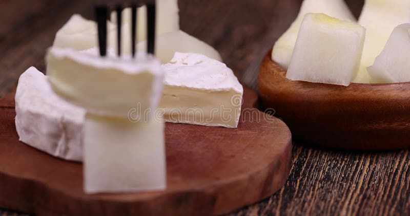 Soft Processed Cheese on a Board and Paper Stock Footage - Video of ...