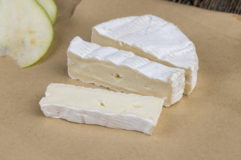 Soft Processed Cheese with White Mold on the Table Stock Photo - Image ...