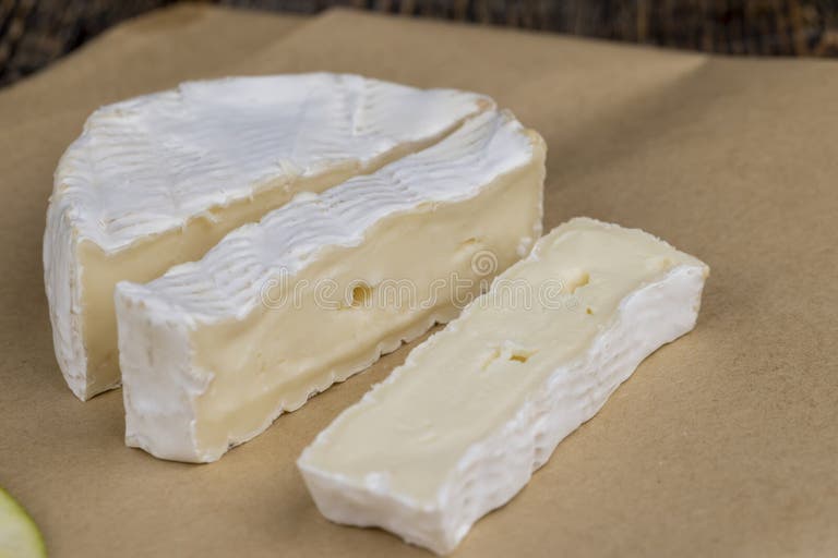 Soft Processed Cheese with White Mold on the Table Stock Photo - Image ...