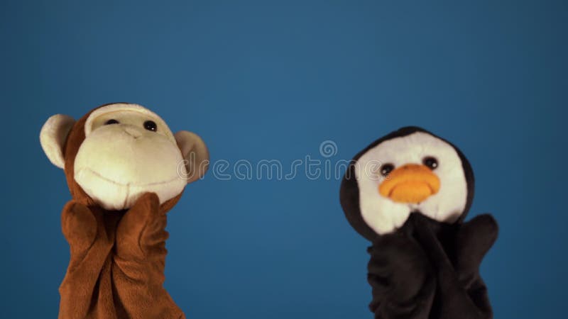 Soft Puppet Toys on Hands on Blue Background. Concept of Puppet Show ...