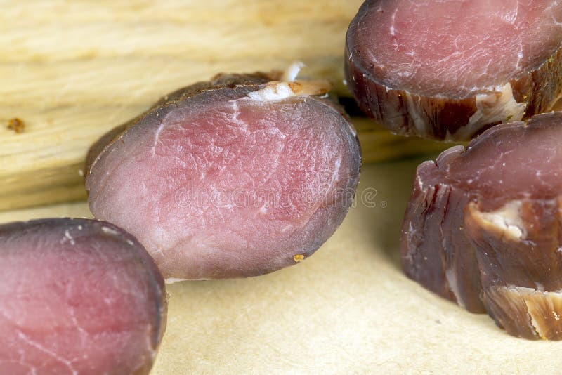 Soft Salted Meat on the Table Stock Photo - Image of dehydrated, slice ...