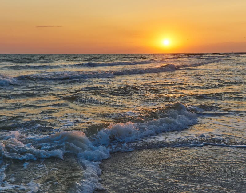 Soft Sea Waves and Bubbles on the Beach with Sunset Sky Stock Photo ...