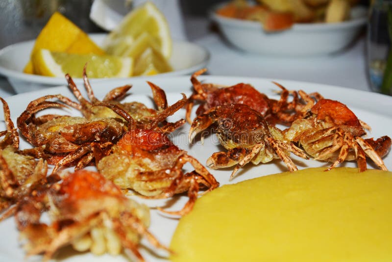 Soft Shell Crabs and Cornmeal Mush, Background Stock Image - Image of ...