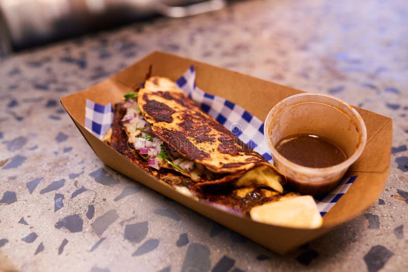 A Soft Shell Taco Ready for Takeaway in a Recyclable Container at a ...