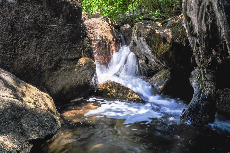 The Soft Stream is Flowing through the Rocks. Stock Image - Image of ...