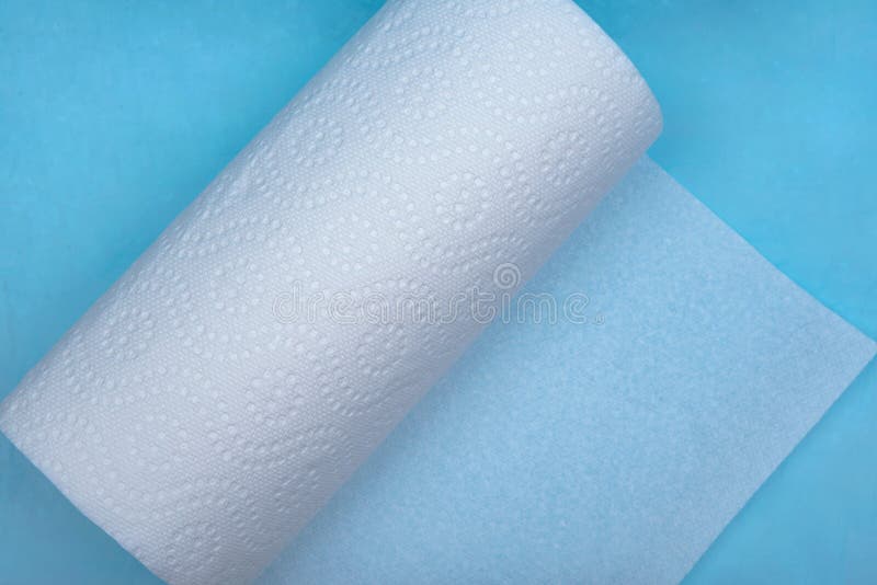 Soft Strong and Absorbent Paper Towel Isolated on Blue Stock Photo ...