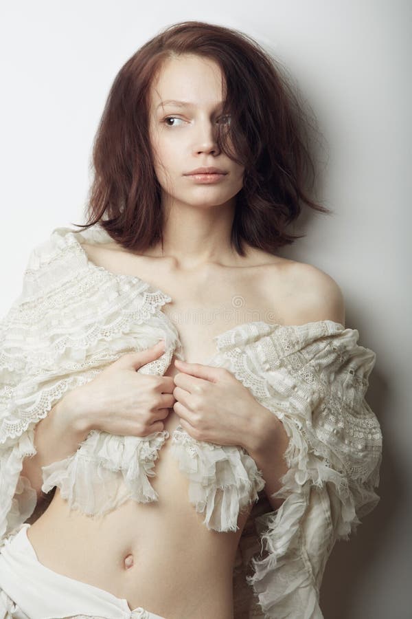 Soft and Subtle Beauty. a Beautiful Young Woman Semi-clad with a Lace ... Soft and Subtle Beauty. a Beautiful Young Woman Semi-clad with a Lace ...