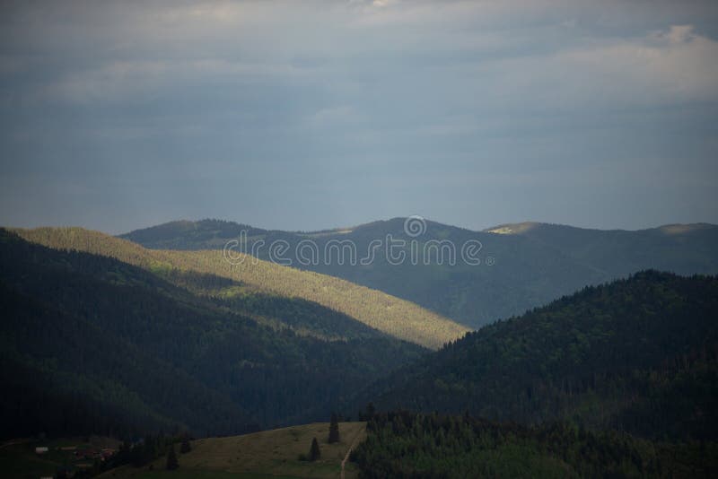 Mountains Bathed in Soft Sunlight during Twilight Hours Showcasing the ...
