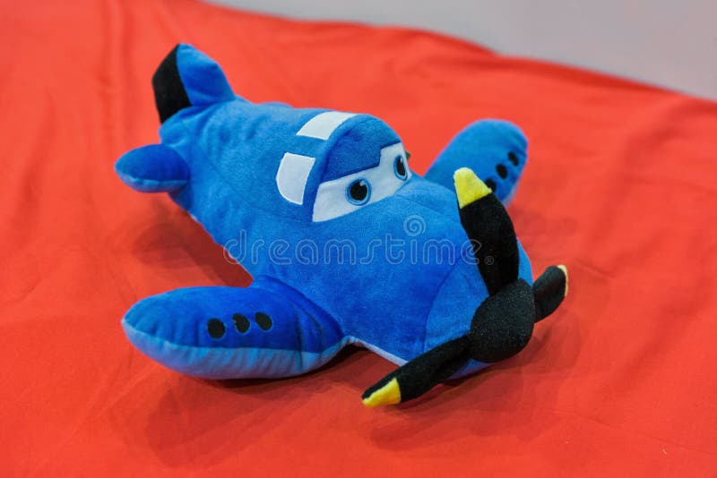 Soft Toy Blue Airplane on Red Closeup Stock Image - Image of journey ...