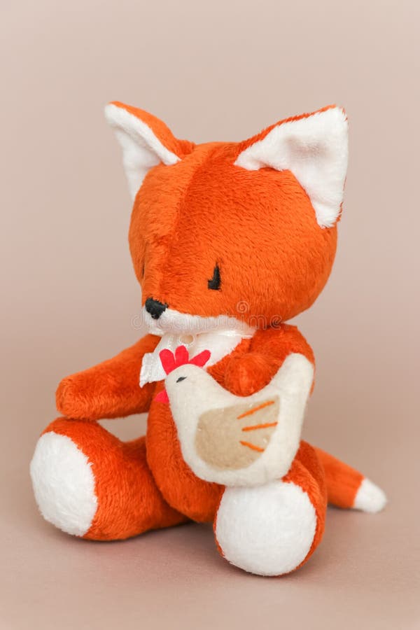 Soft Toy Ginger Fox with Chicken on a Light Background Stock Image ...