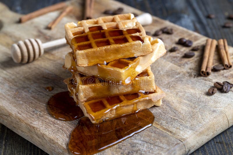 Soft Waffles with Natural Bee Honey on a Serving Board Stock Image ...