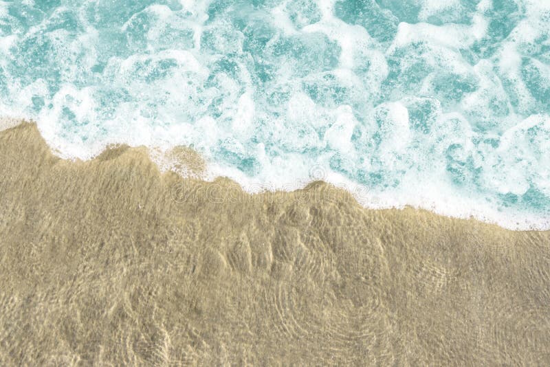 Soft Wave of Blue Ocean on Sandy Beach. Background / Sand and Wave at ...