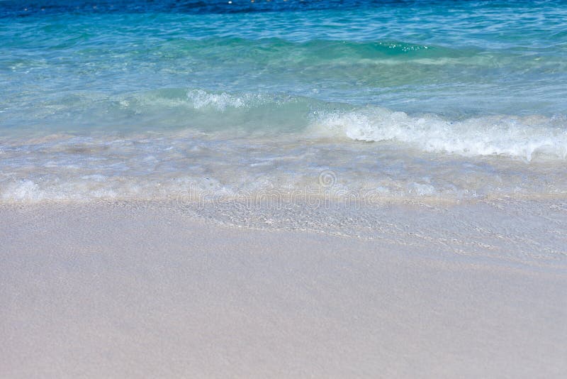 Soft Wave of Blue Ocean on Sandy Beach. Background. Selective Focus ...
