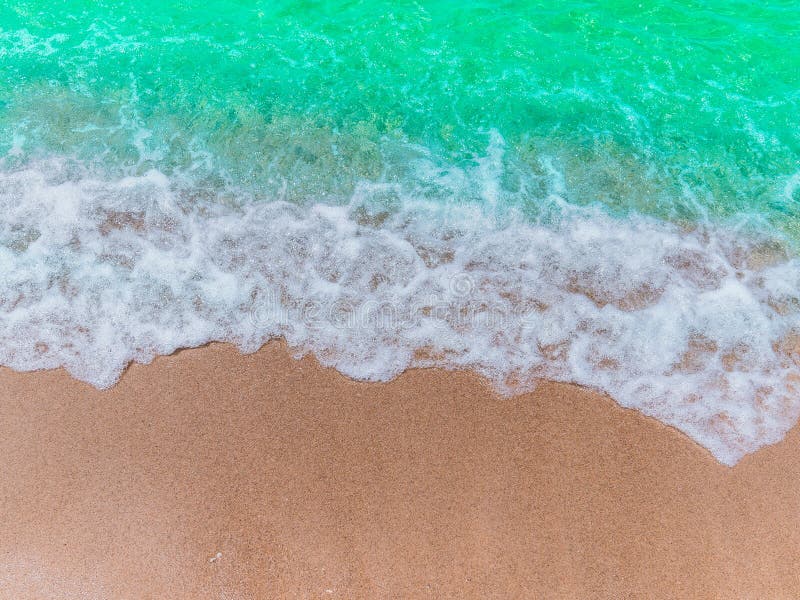 Soft Wave of Blue Ocean on Sandy Beach. Background. Selective Focus ...