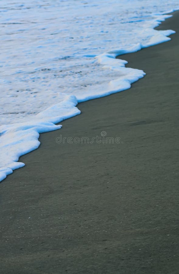 Soft Wave of Blue Ocean on Sandy Beach. for Using Background. Selective ...
