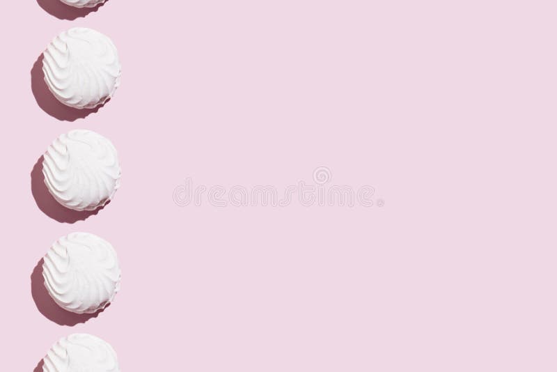 Soft White Vanilla Zephyr on Light Pink Table. Pastel Color Stock Photo ...