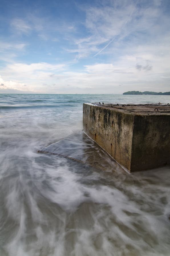 Soft White Wave Hitting Concrete Structure on the Beach Stock Image ...