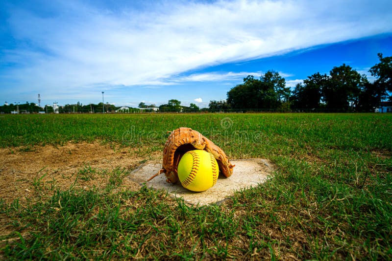 Softball and Glove on Homepage and View of a Softball Field from Home ...