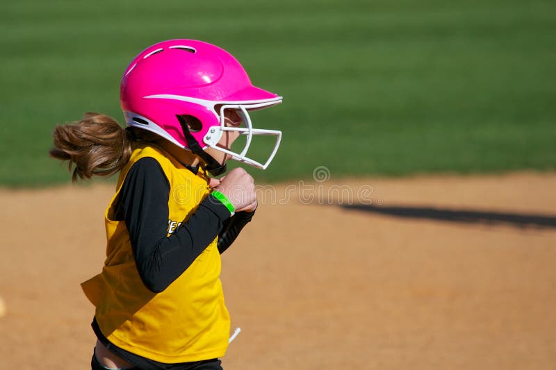 Softball Player Running Looking Surprised at the Play Stock Image ...