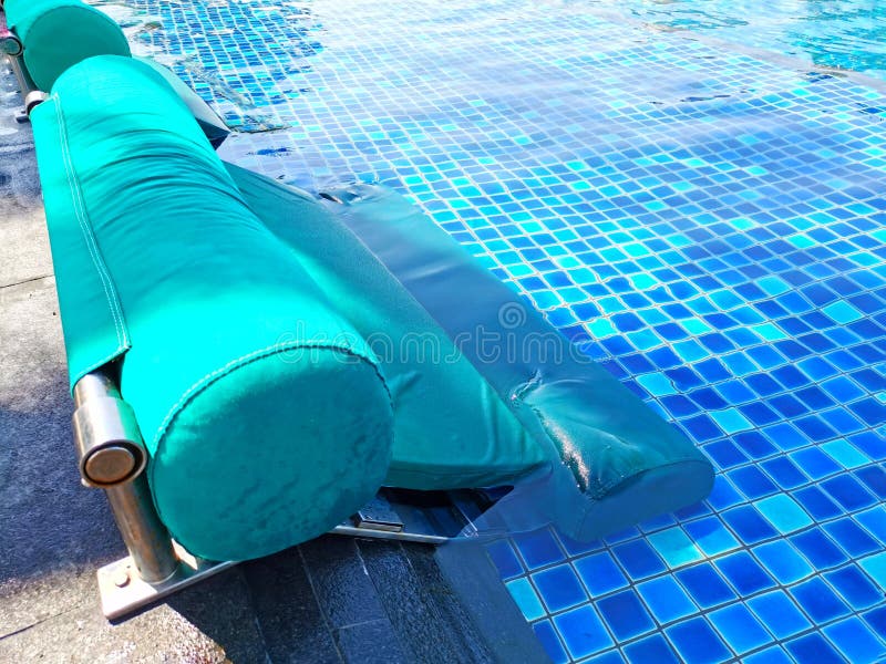 Softseats on the Edge of the Pool with Waves on the Water Surface the ...