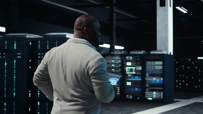 Software Developer in Data Center Using Tablet, Employing Machine ...