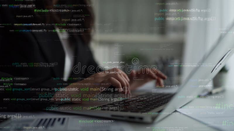 Professional Software Developer Working on Coding Tasks with Laptop Surrounded by Programming ...