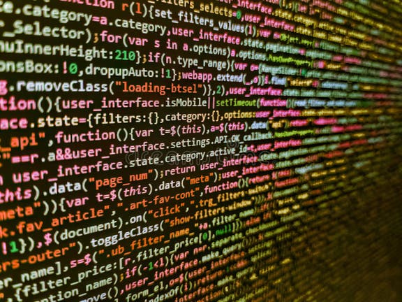 Software Developer Programming Code on Black Screen. Lots of Digits on ...