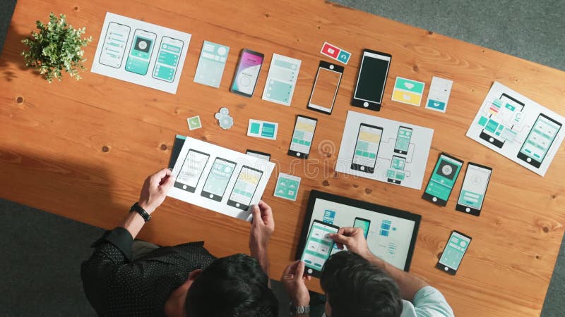 Smart Software Developer Team Holding Software Icon and Discussing ...