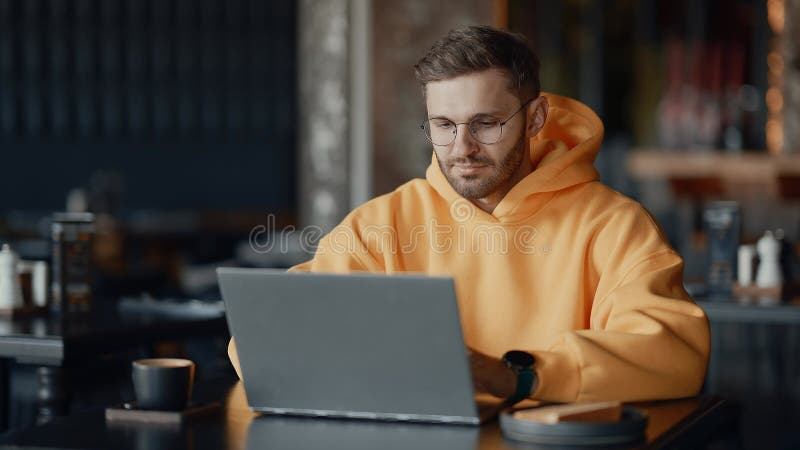 Software Developer or Web Designer Working Remotely with Laptop in City ...