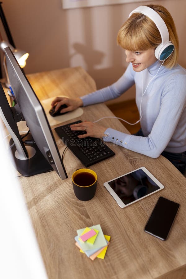 Female Software Developer Taking Lunch Break while Working Remotely ...