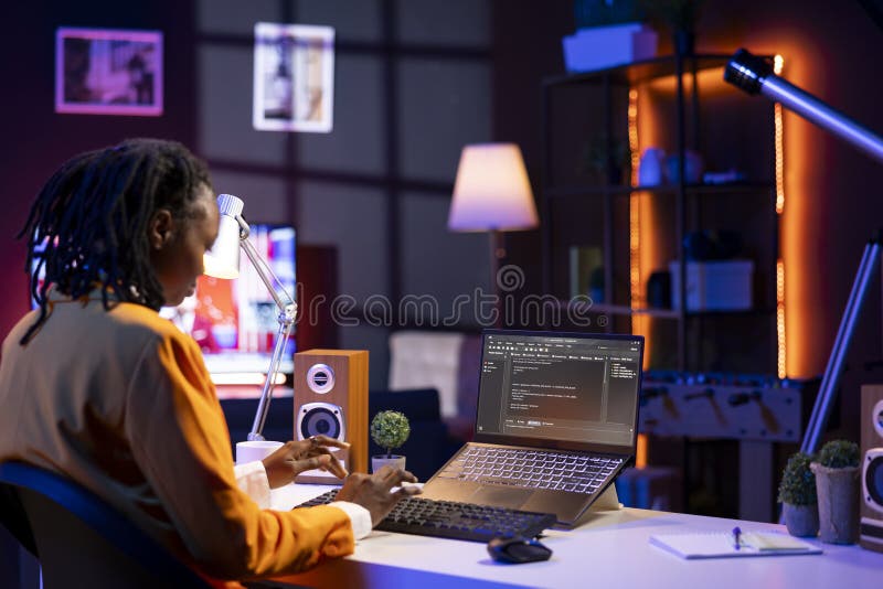 Software Developer Writes Code on Laptop Screen in Apartment Office ...