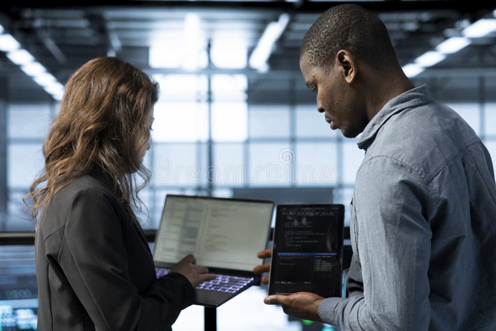 Software Developers in Data Center Coding on Laptop Stock Photo - Image of tasks, cooperation ...