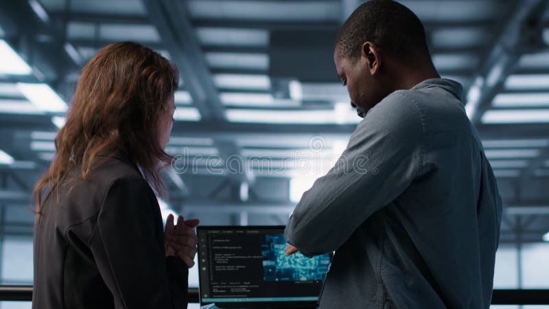 Software Developers in Data Center Using Laptop, Employing AI Machine Learning Stock Video ...