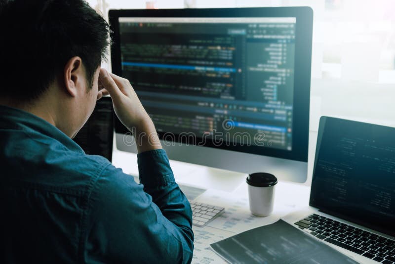 Software Developers Headache with Code Analysis in the Office Stock ...