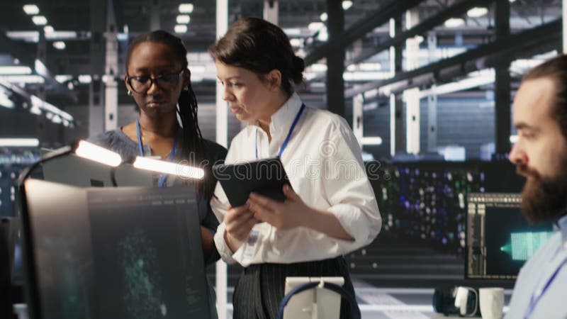 Software Developers Working Together in Server Farm, Reviewing AI Code ...