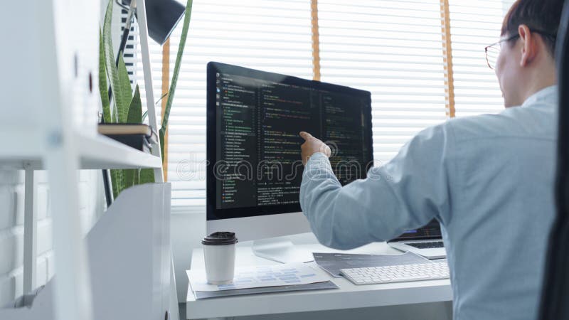 Software Development Concept, Male Programmer Checking Data Codes on ...