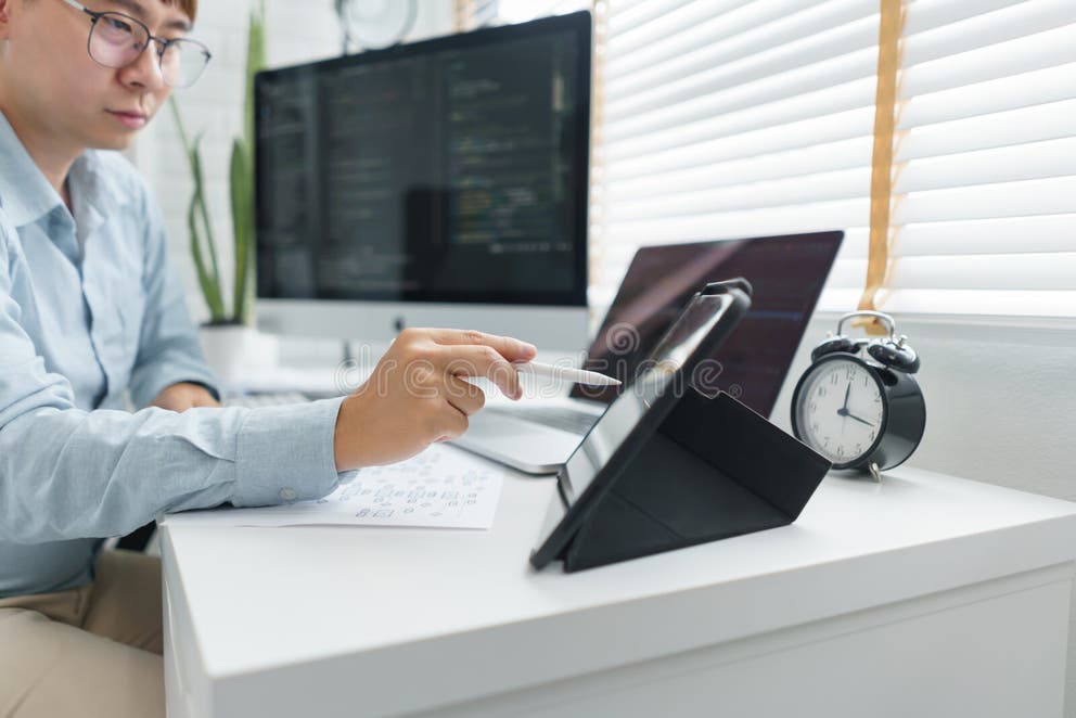 Software Development Concept, Male Programmer Point Data on Tablet To ...