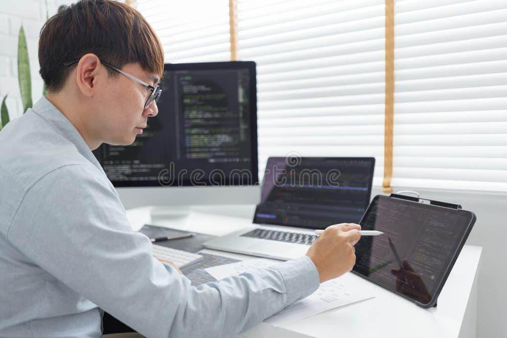 Software Development Concept, Male Programmer Point Data on Tablet To Checking Website ...