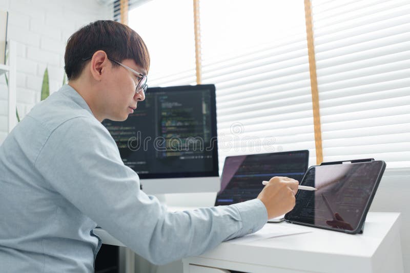 Software Development Concept Male Programmer Point Data On Tablet To