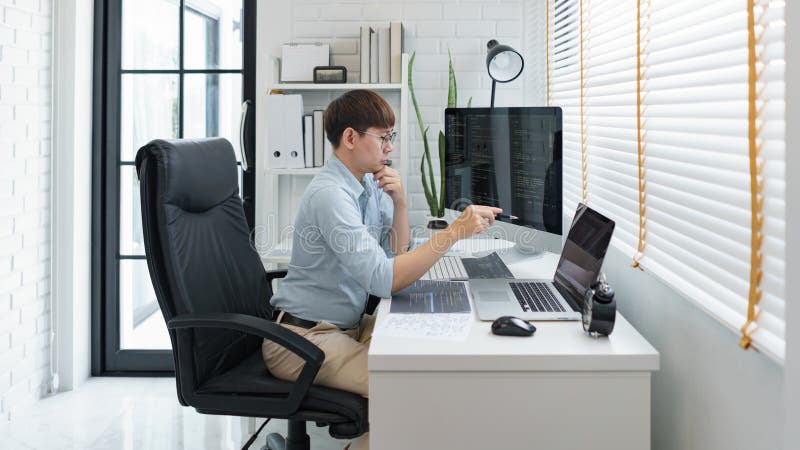 Software Development Concept, Male Programmer Pointing on Laptop Screen ... Software Development Concept, Male Programmer Pointing on Laptop Screen ...