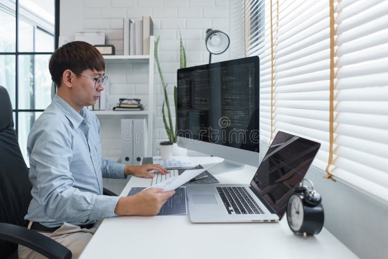 Software Development Concept Male Programmer Read Data On Document
